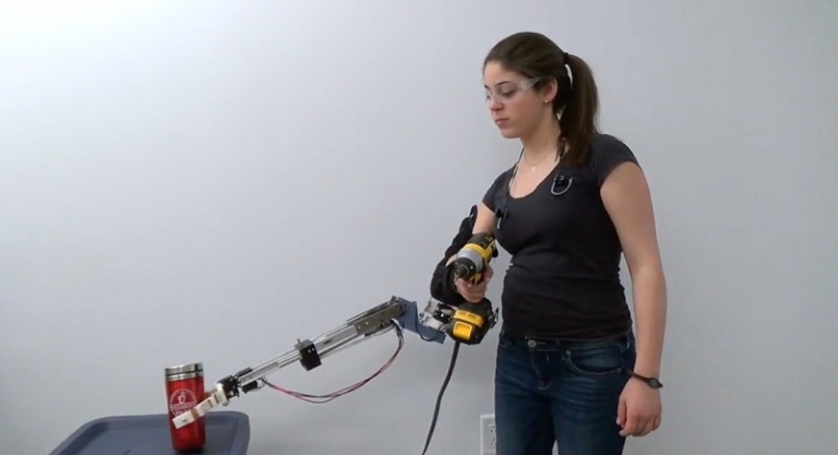 This wearable robotic arm can help you use power tools and punch ...